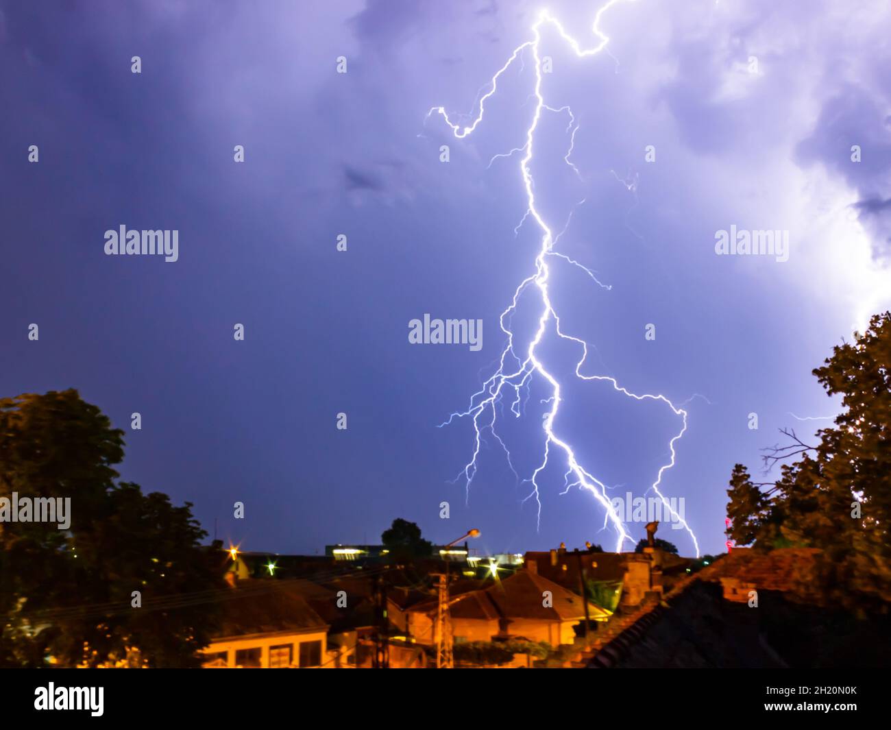 Image of an admirable thunder lightning in a small village Stock Photo ...