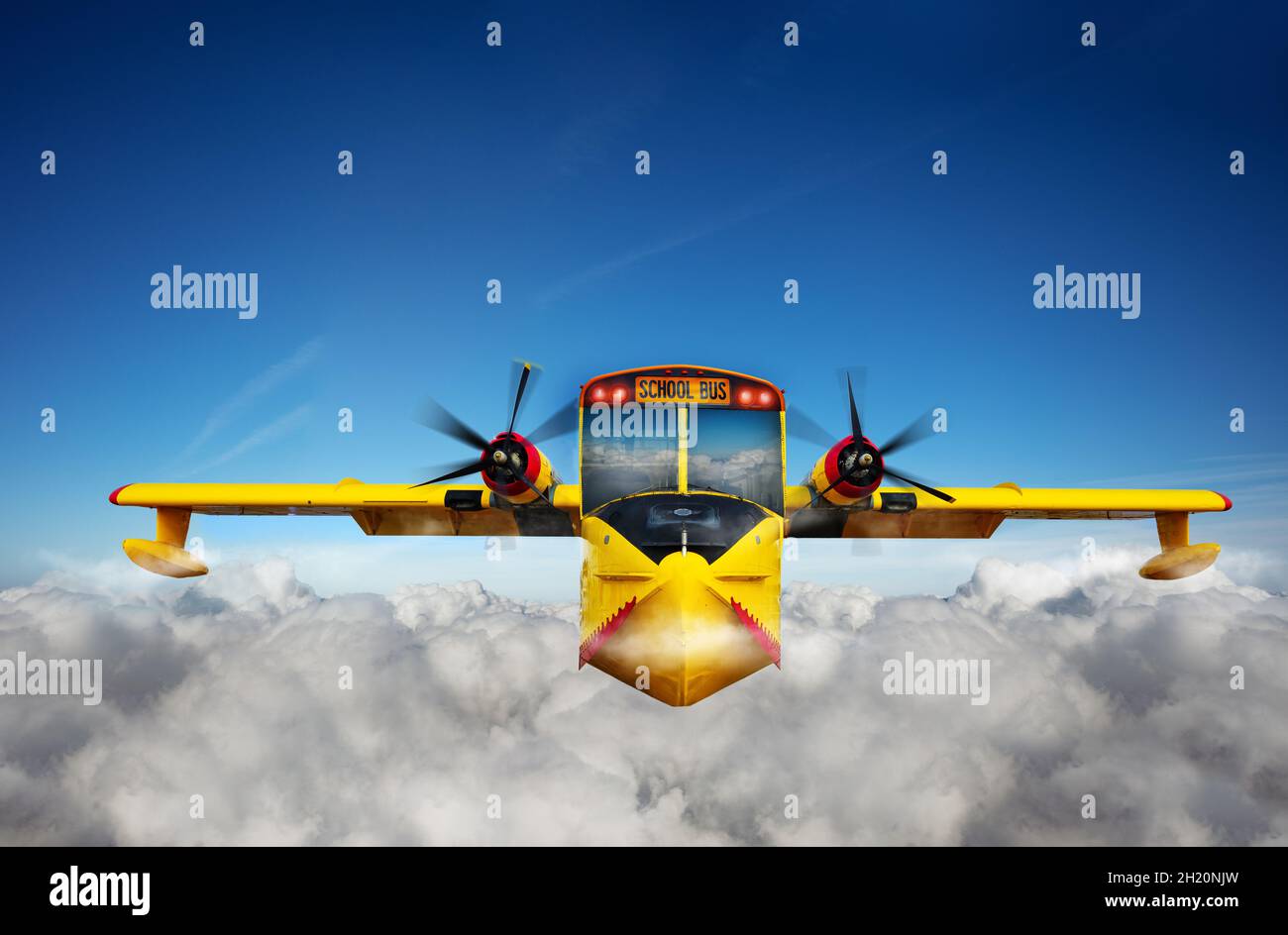 School bus airplane concept fly in the clouds sky Stock Photo - Alamy
