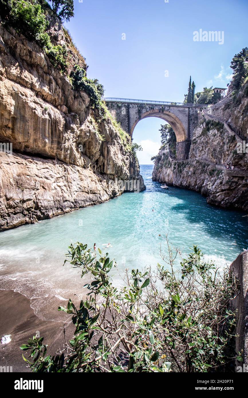 Fiordo di Furore is an arched stone bridge crosses this striking gorge ...