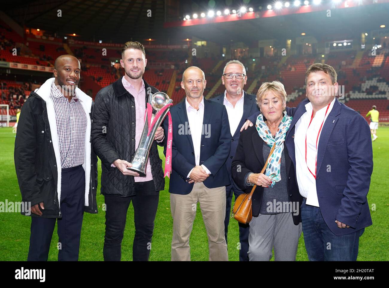 Kent Cricket's Alex Blake (second left) holds the T20 trophy on the ...