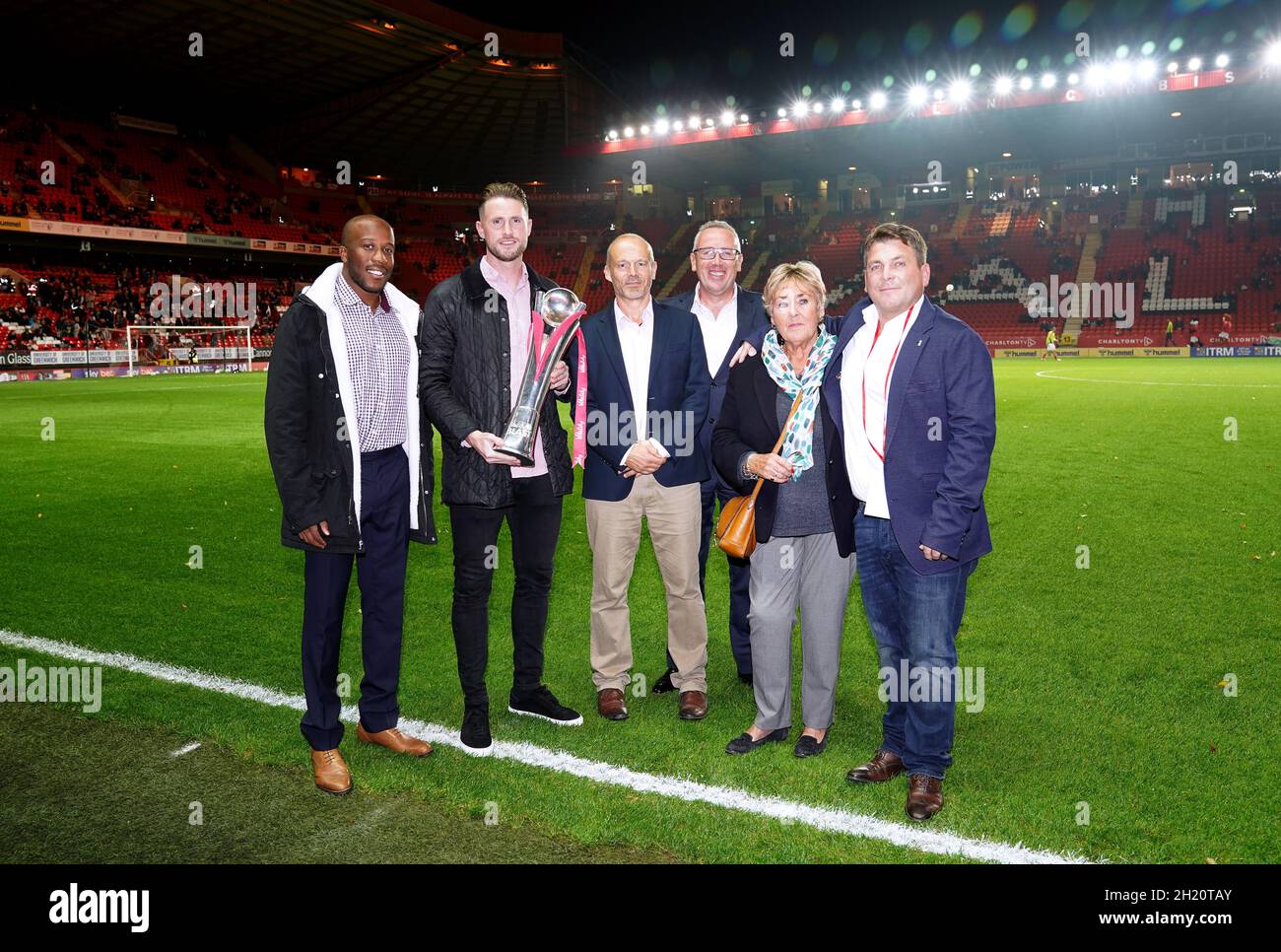 Kent Cricket's Alex Blake (second left) holds the T20 trophy on the ...