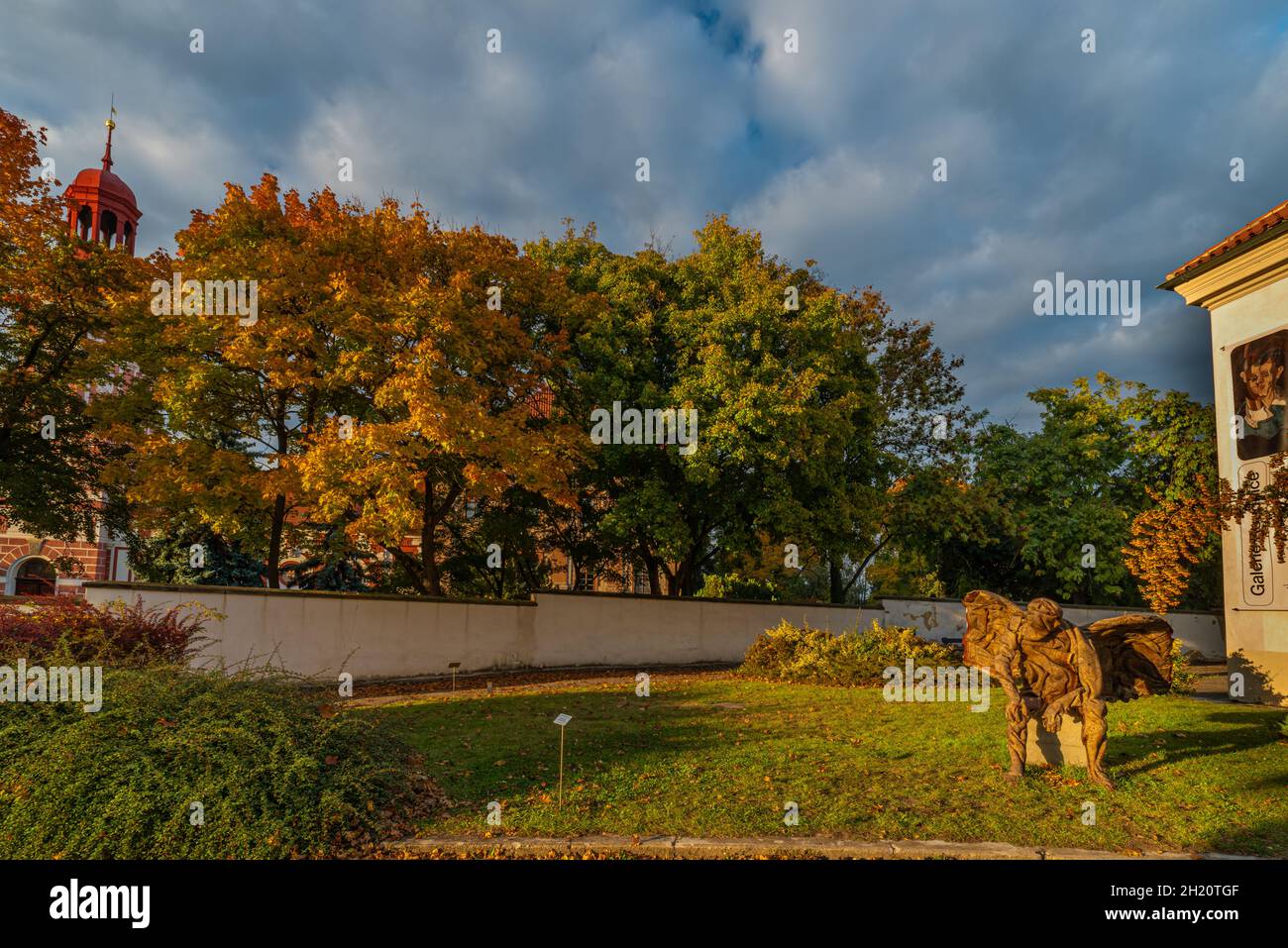 Orange sunset in Roudnice nad Labem town with old church and towers ...