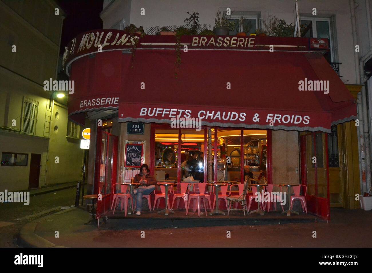 FRANCE, PARIS. 20.02.2012. Very cute, colorful and pink cafe facade in ...