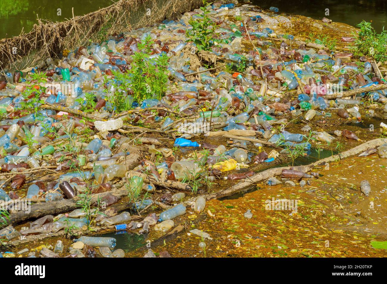 River pollution plastic bottles other trash on garbage on plastic at ...