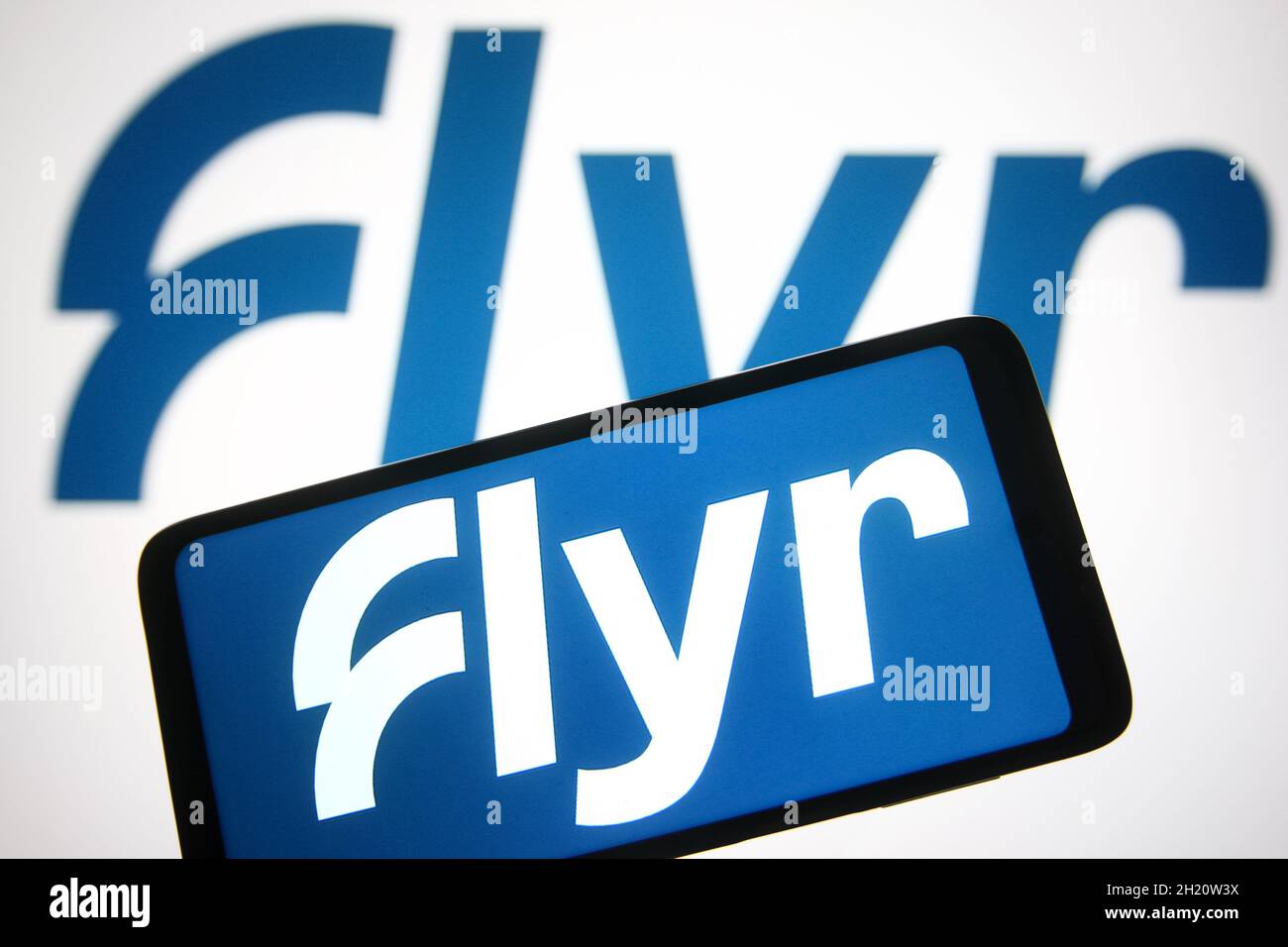 In this photo illustration, Flyr AS logo of a Norwegian low-cost ...