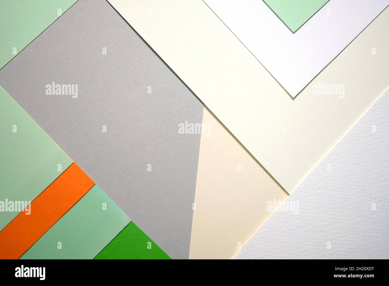 Colored paper sheets abstraction. Background from paper laid out in the ...