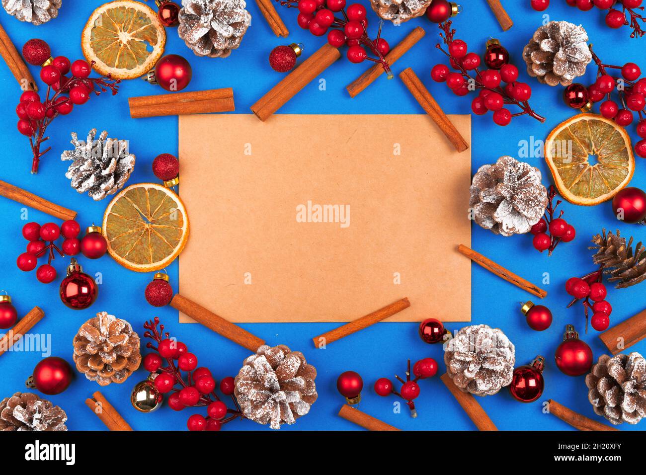 Christmas composition with empty sheet of paper in the center Stock ...