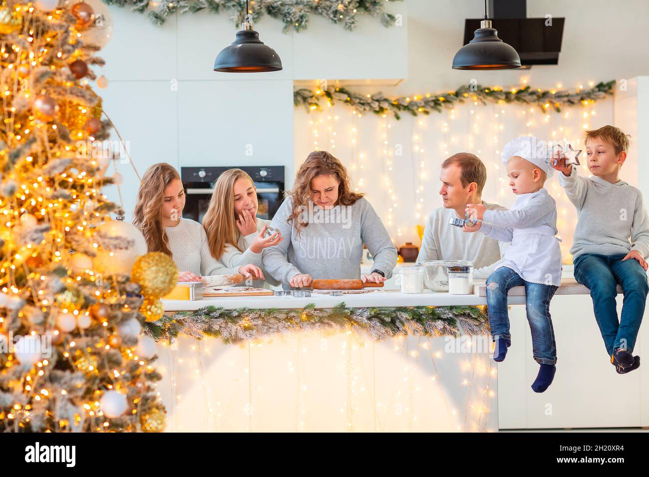Big happy family making gingerbread, cutting cookies of gingerbread ...