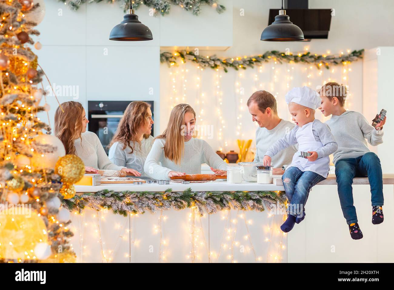 Big happy family making gingerbread, cutting cookies of gingerbread ...