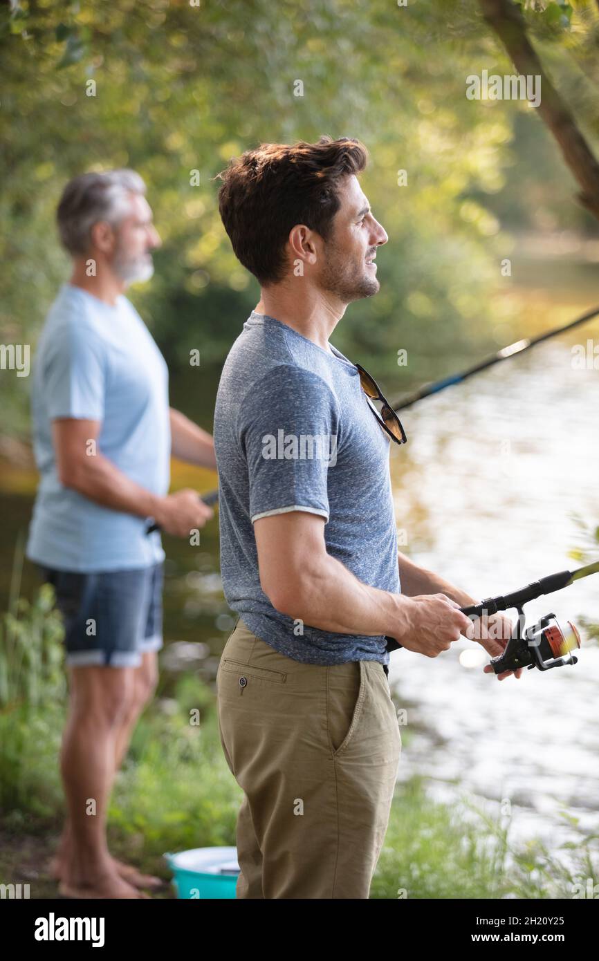 Two men stood hi-res stock photography and images - Alamy