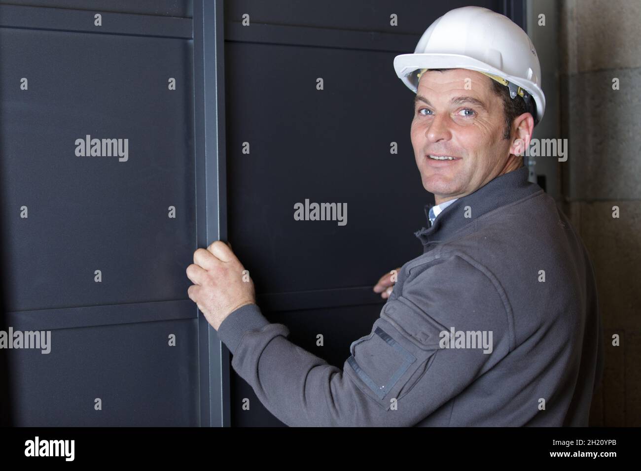 Engineer checking building documentation hi-res stock photography and ...