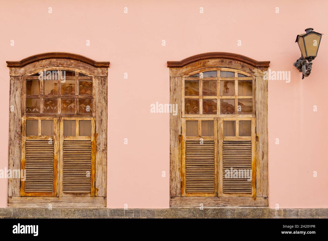 Two colonial-style windows in a house in the city of Goiás Stock Photo ...