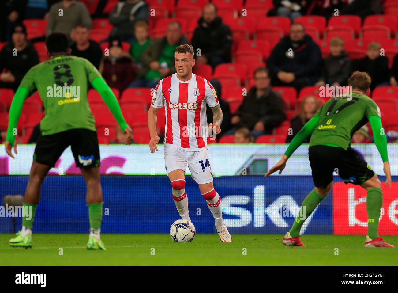 Stoke On Trent, UK. 19th Oct, 2021. Josh Tymon #14 of Stoke City runs ...