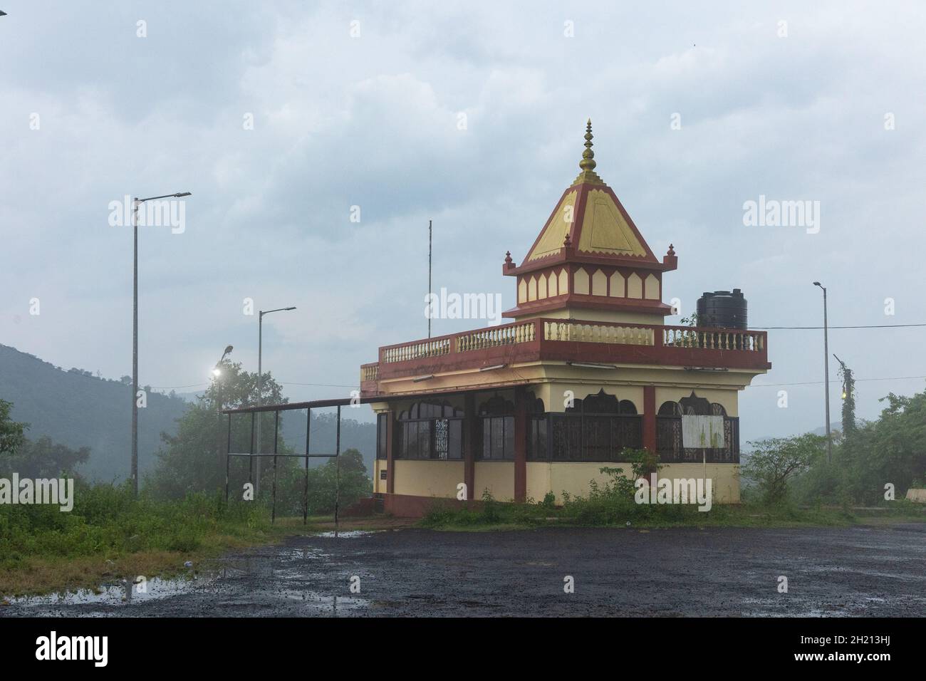 Beautiful mountain top Shankar Parvati Temple during monsoon season ...