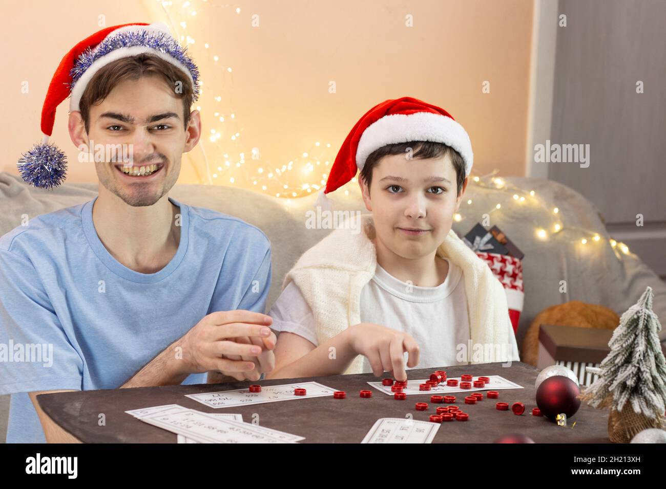 Christmas. Portrait of two guys. Christmas tree. winter holidays and ...