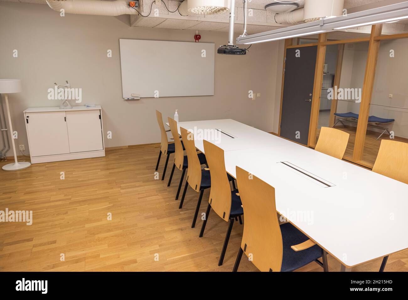 Beautiful view of modern conference meeting room. White office table ...