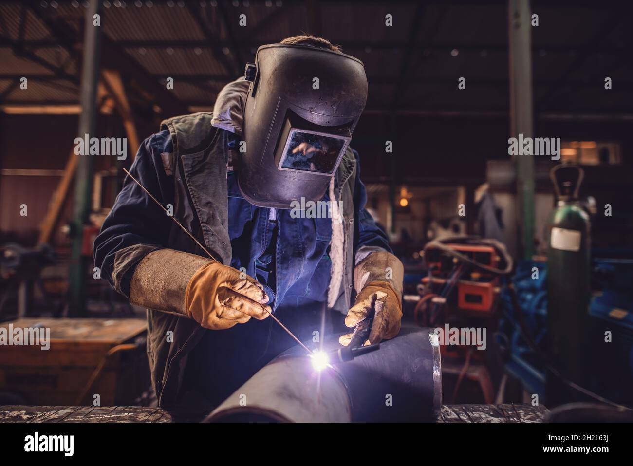 Skilled worker protective suit hi-res stock photography and images - Alamy