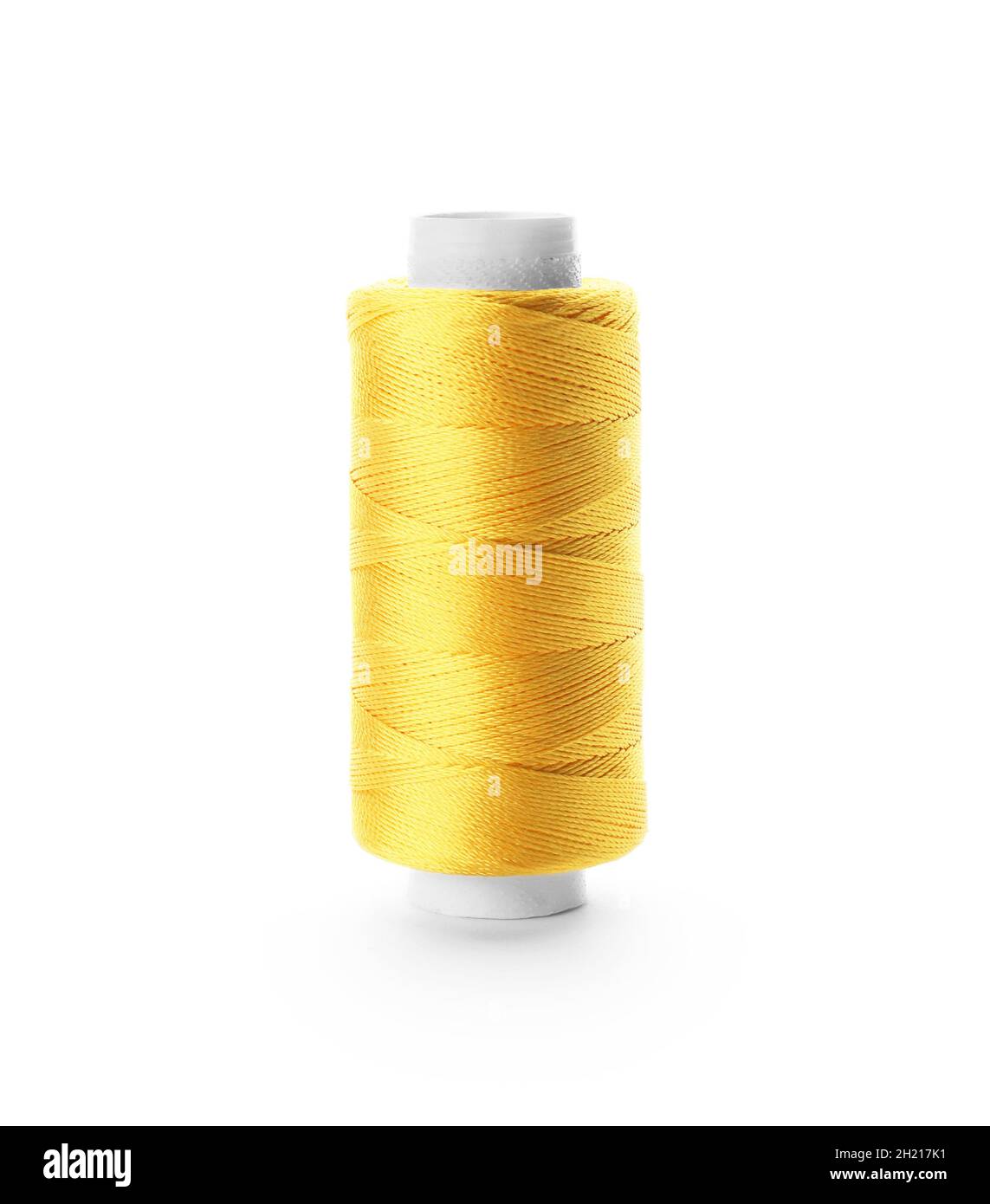 Color sewing thread on white background Stock Photo - Alamy