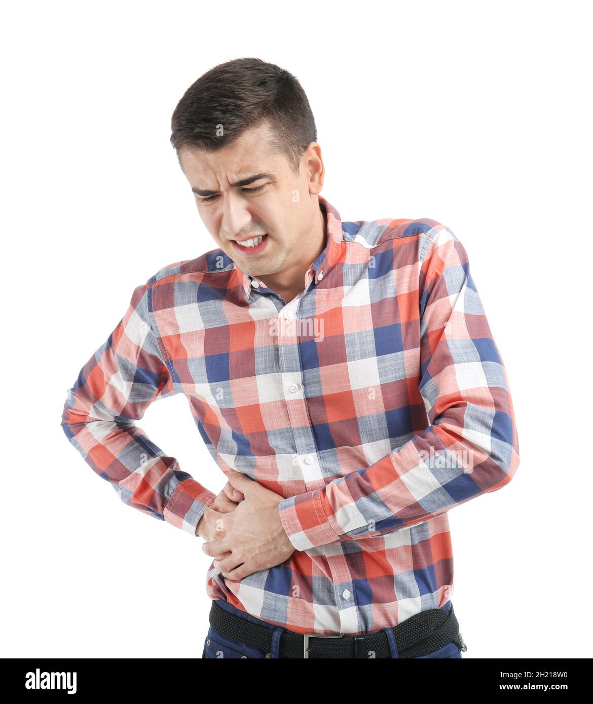 Man suffering from flank pain on white background Stock Photo - Alamy