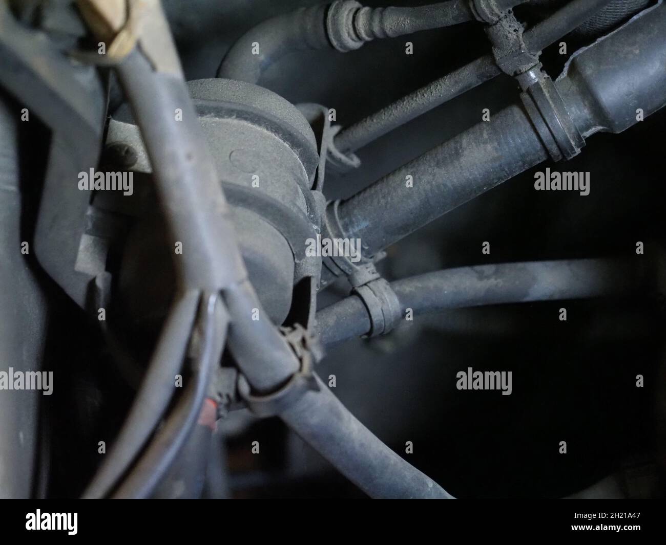 detail of car engine pipes and parts useful as an industrial background ...