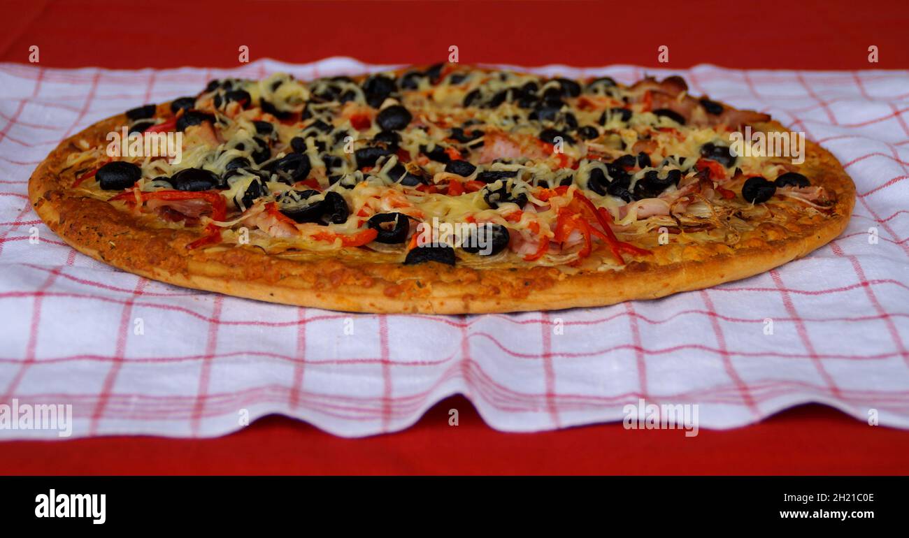 delicious large Italian home-made pizza Stock Photo - Alamy