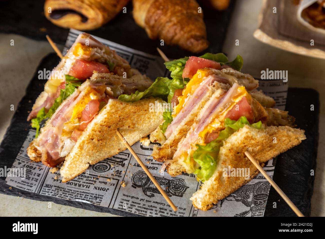 Closeup shot of two gourmet club sandwiches Stock Photo - Alamy