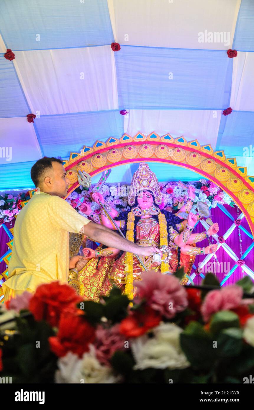 Aarti being offered to Goddess Durga during Durga Puja celebrations by ...