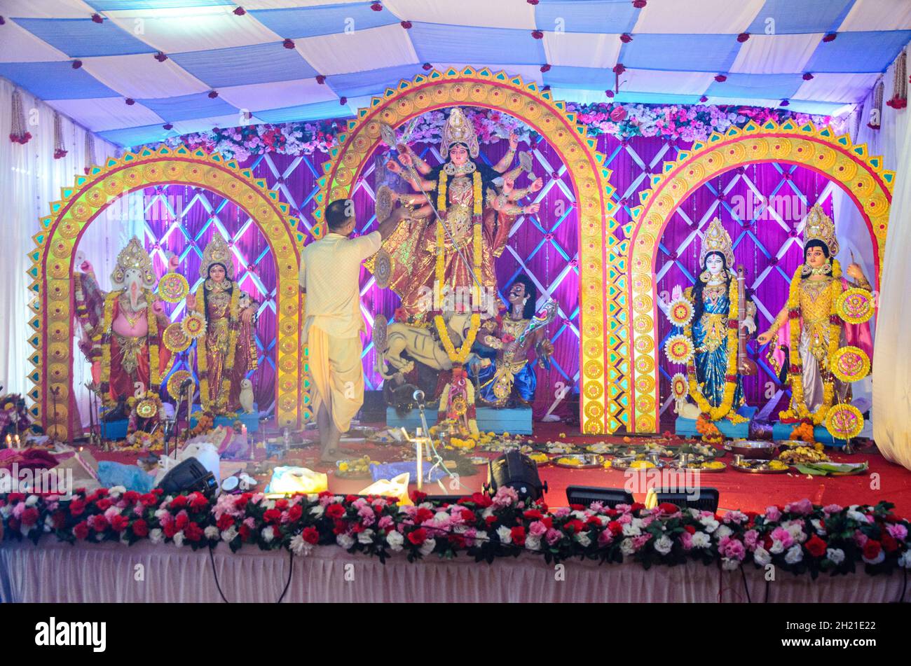 Aarti being offered to Goddess Durga during Durga Puja celebrations by ...