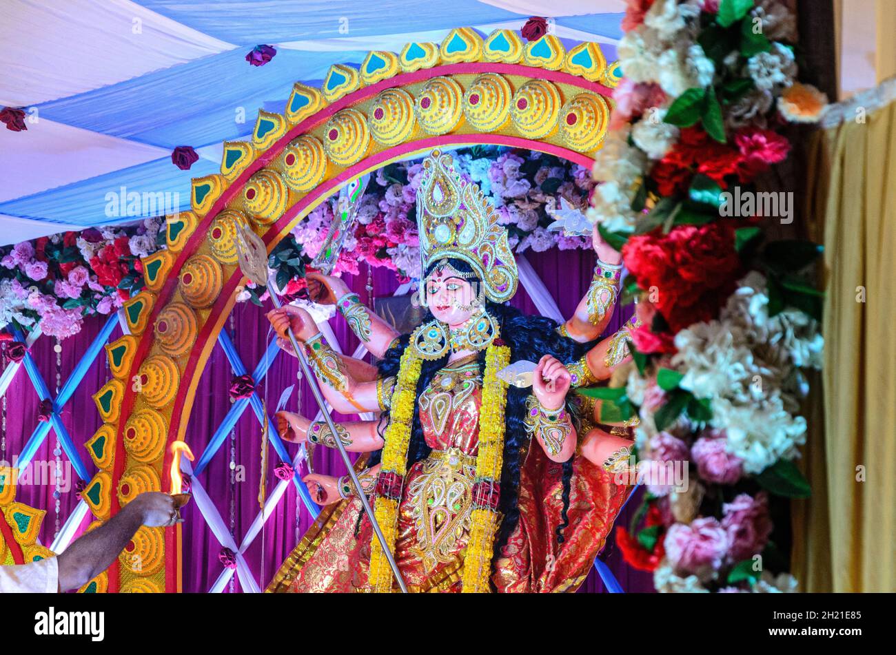 Aarti being offered to Goddess Durga during Durga Puja celebrations by ...