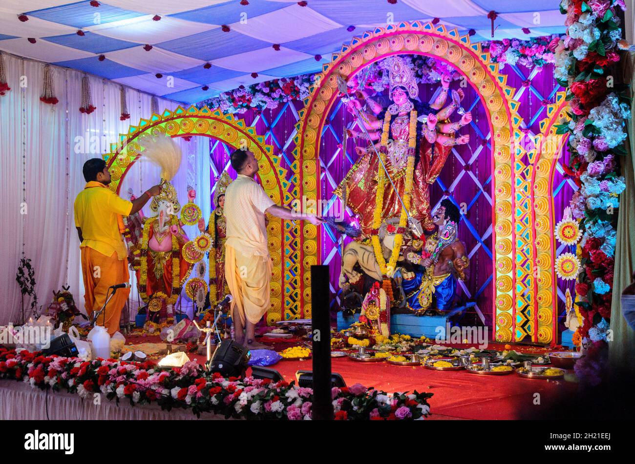 Aarti being offered to Goddess Durga during Durga Puja celebrations by ...