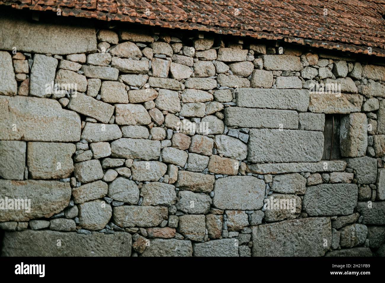 Exterior view of an old village house Stock Photo - Alamy