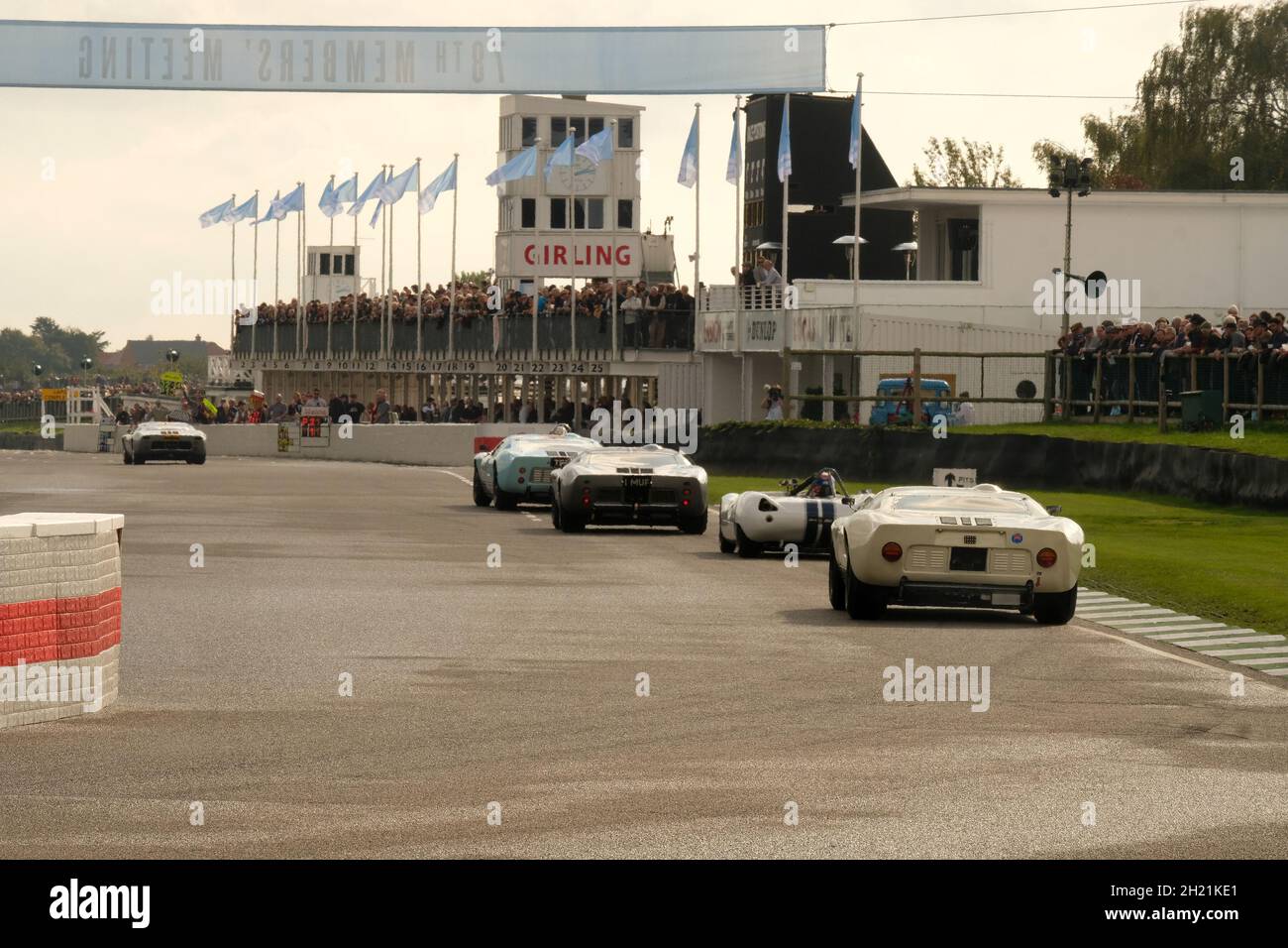 October 2021 - Chasing Ford GT40 cars on the pit straight during the ...
