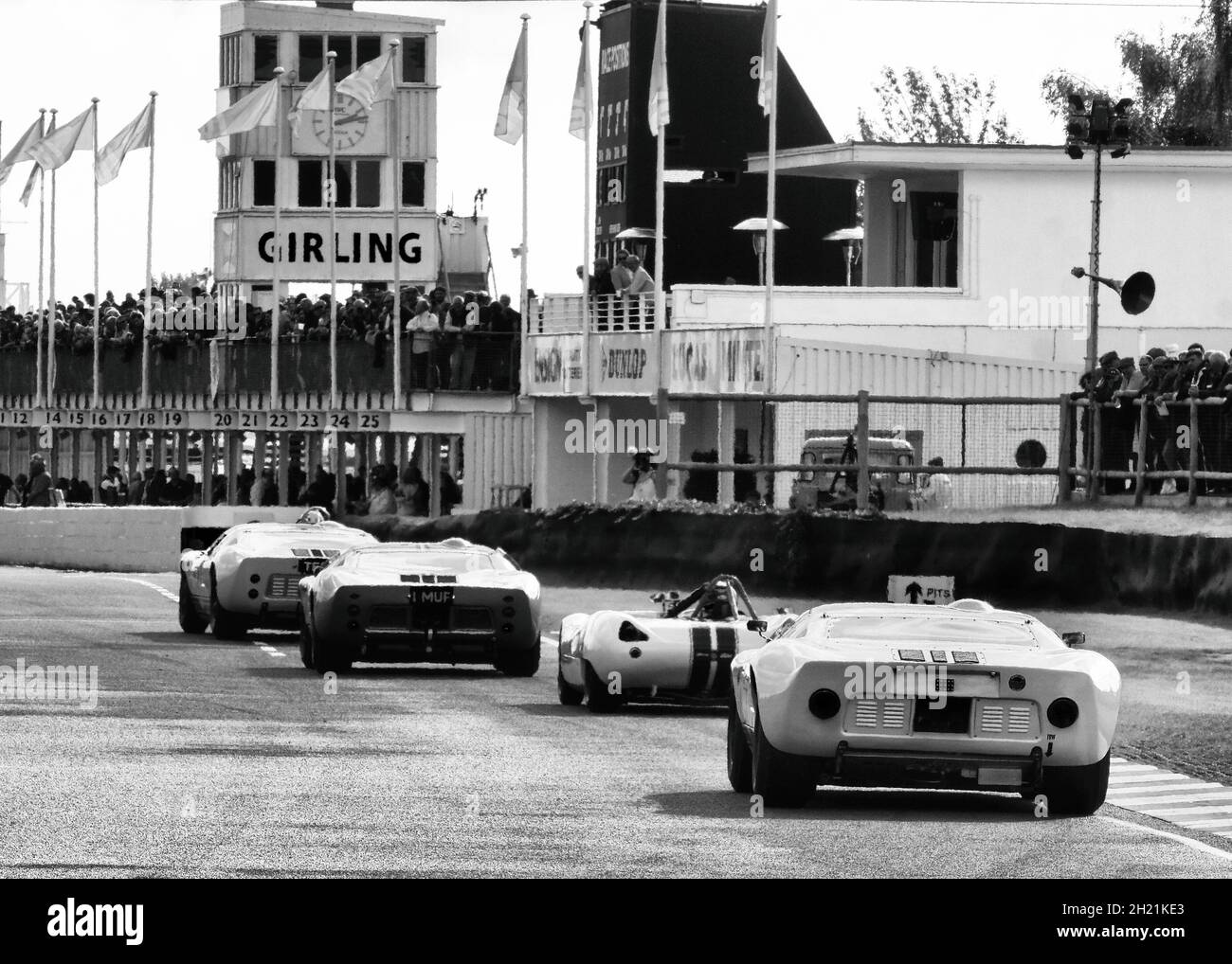 October 2021 - Chasing Ford GT40 cars on the pit straight during the ...