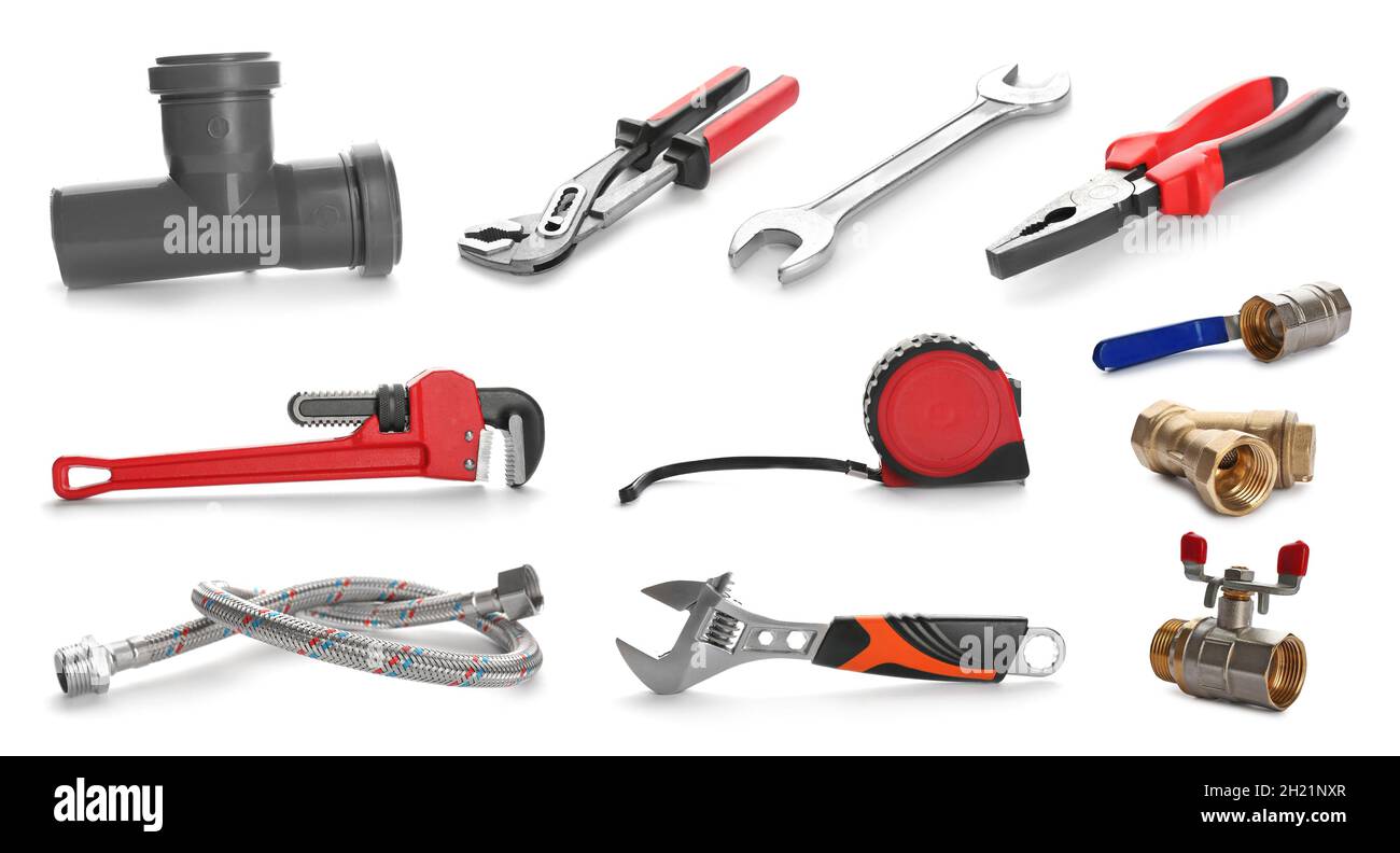 Set of different tools and fittings on white background. Plumber ...