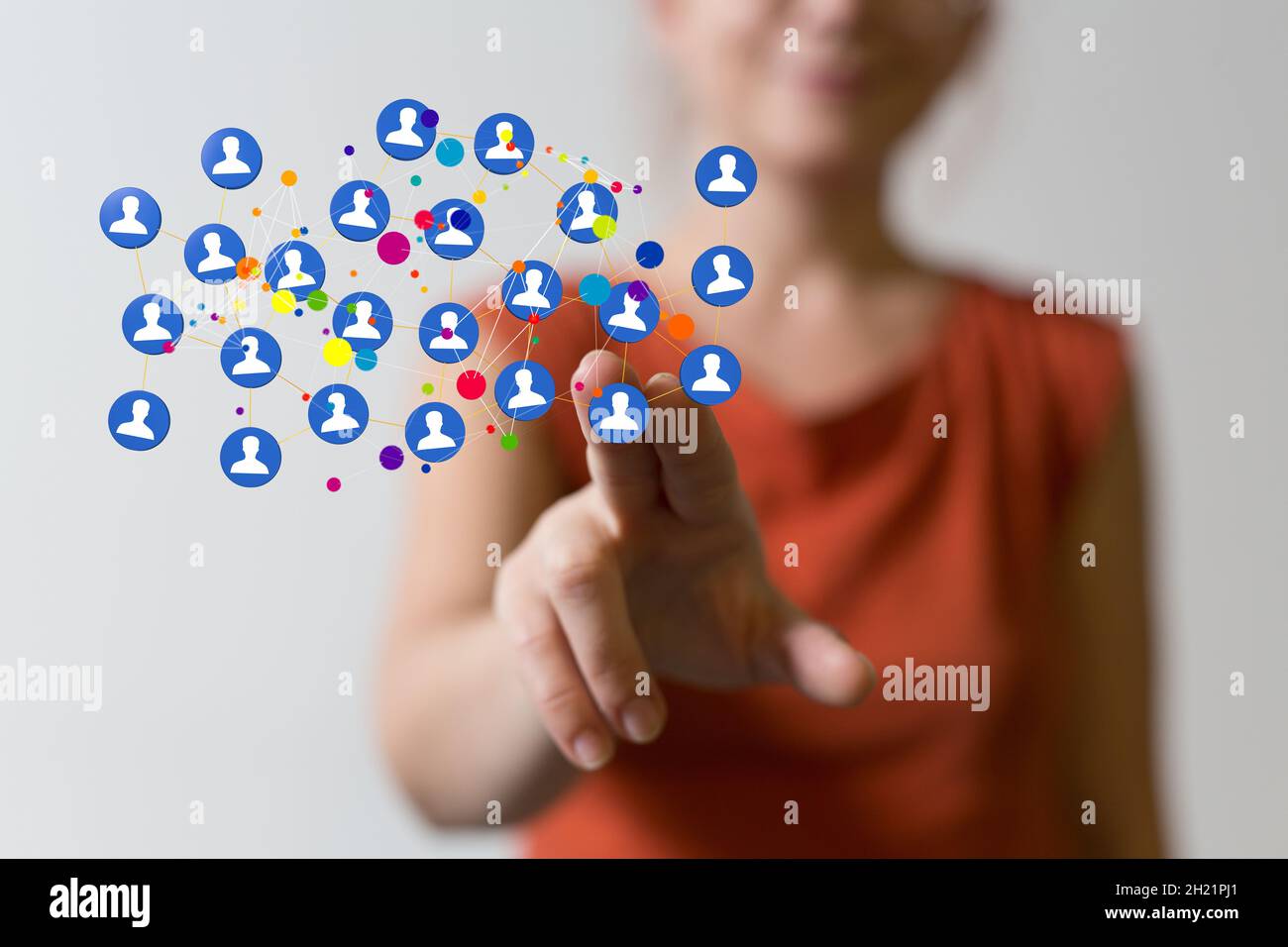 Person tapping on 3D rendered profile icons Stock Photo - Alamy
