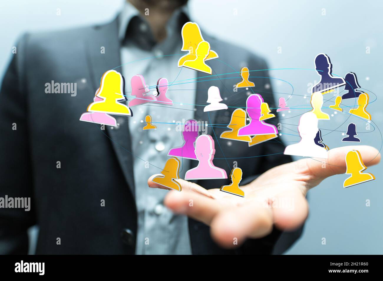 3D rendered people icons hovering over the person's hand Stock Photo ...