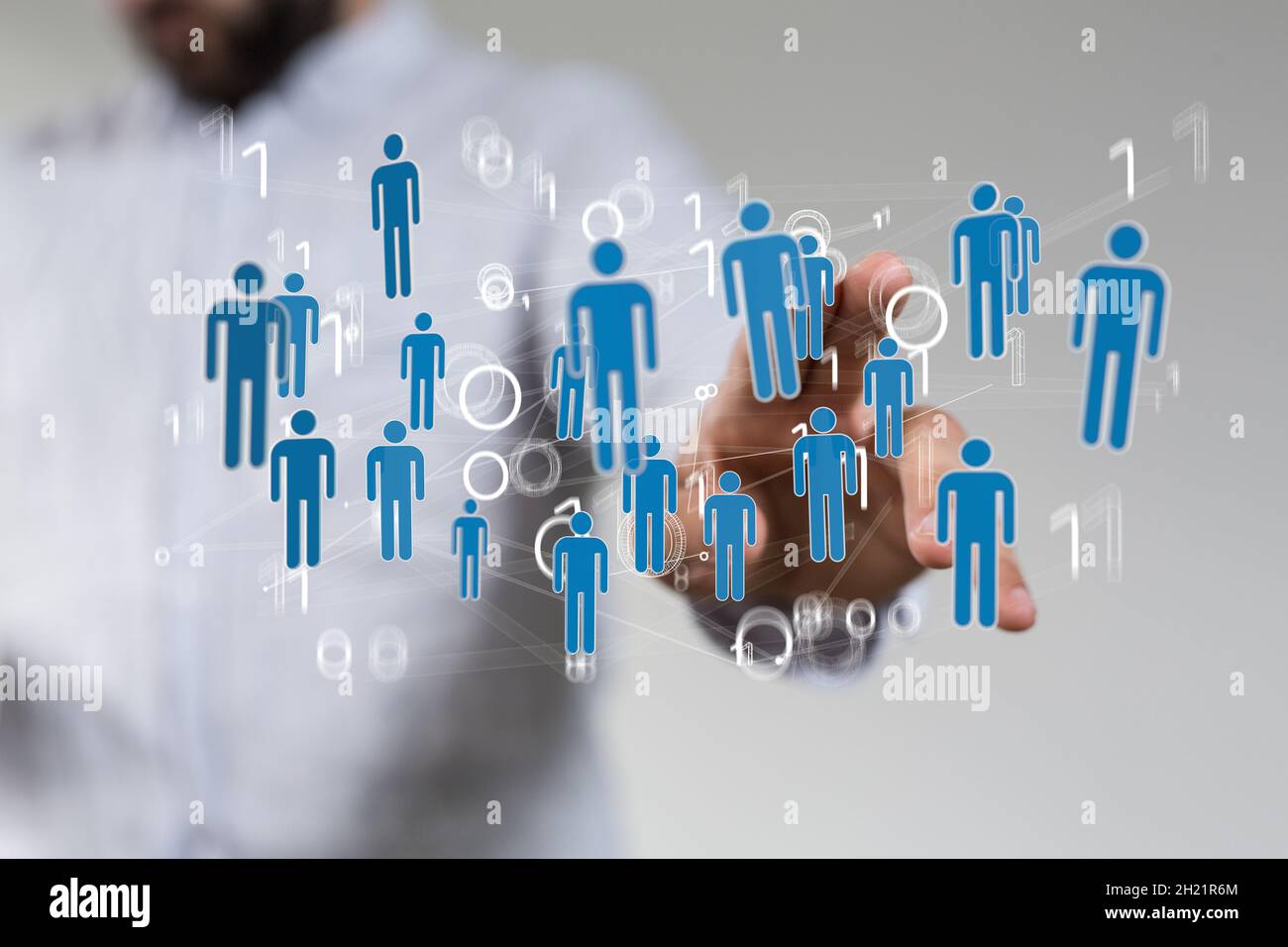 Person tapping on 3D rendered people icons Stock Photo - Alamy