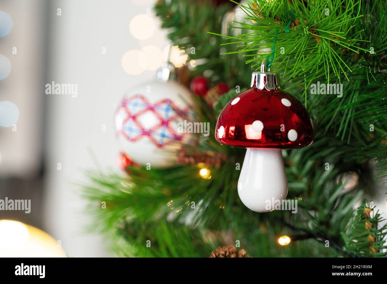 Red and white baubles hanging from a Christmas tree close up Stock ...