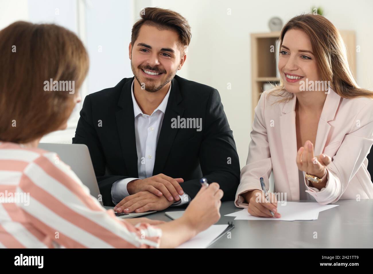 Human resources commission conducting job interview with applicant in office Stock Photo - Alamy