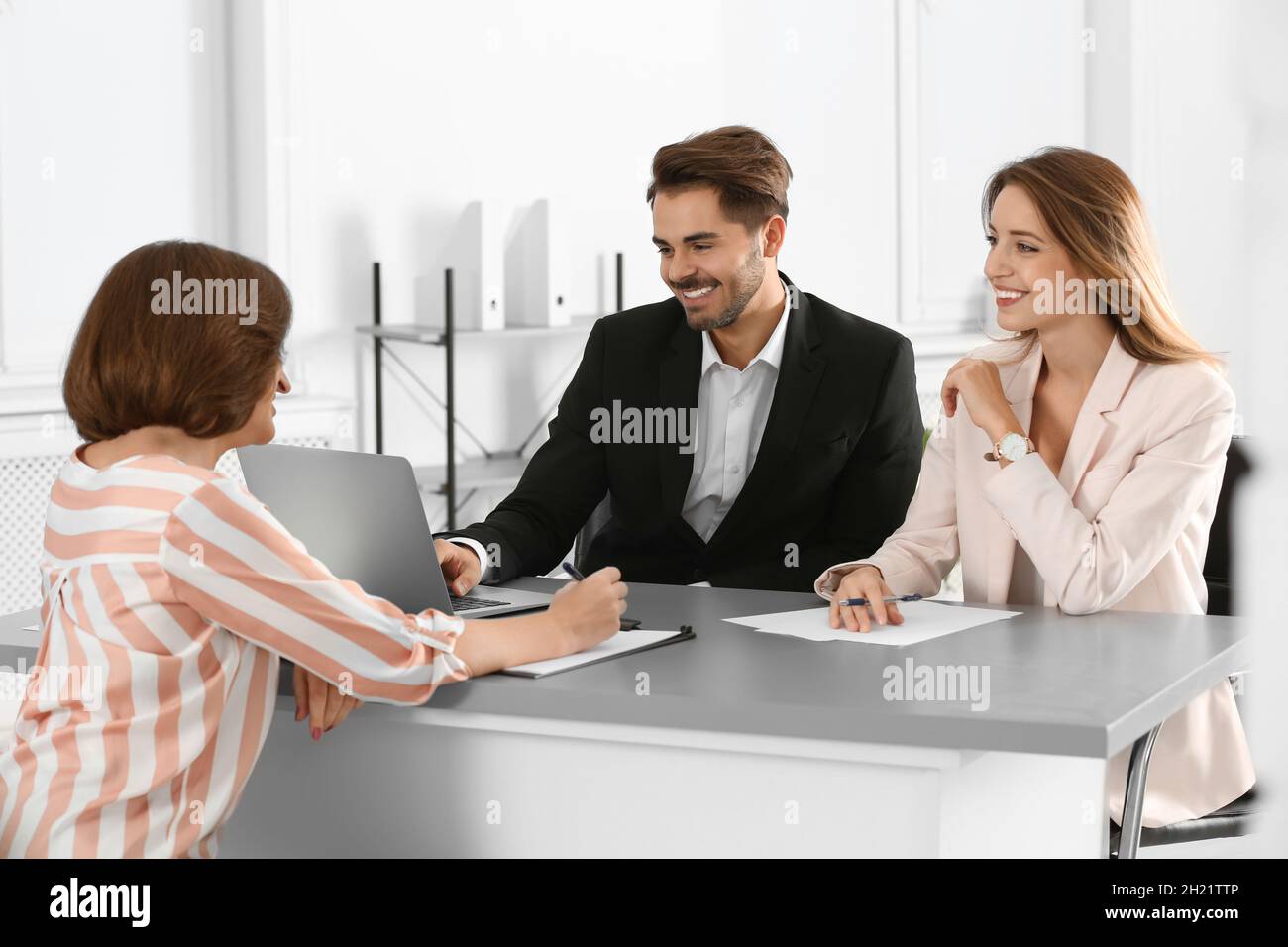 Human resources commission conducting job interview with applicant in ...
