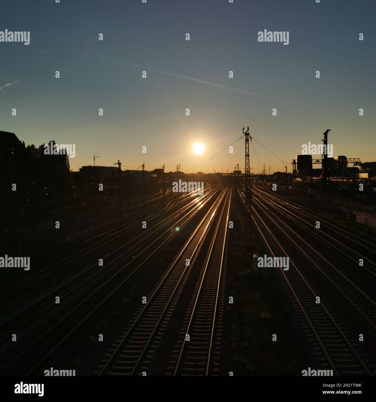 Sunset over the rails Stock Photo - Alamy
