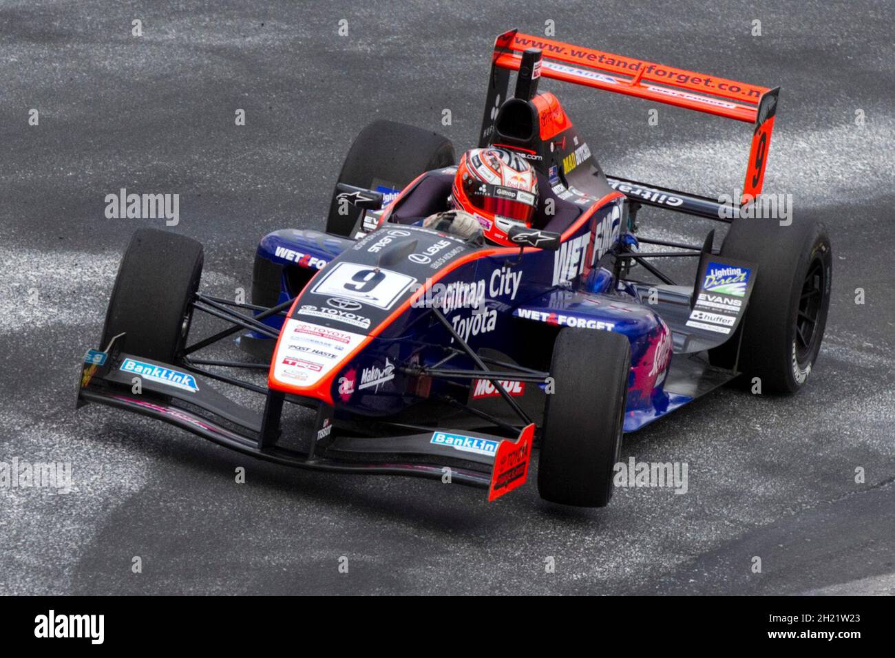 Racing driver racing car competition driving speed hi-res stock ...