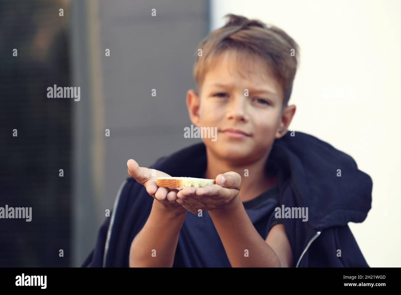 Orphan begging for money on the street hi-res stock photography and ...