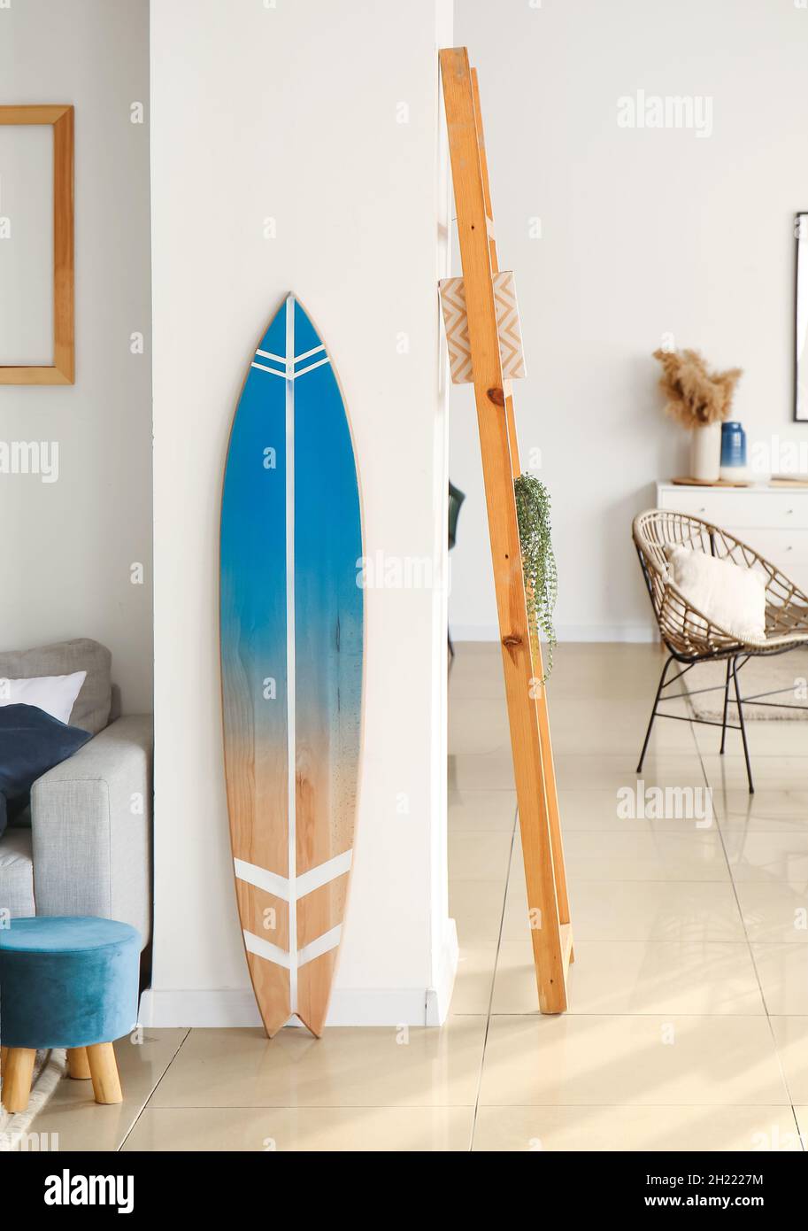 Interior of modern room with stylish surfboard Stock Photo - Alamy