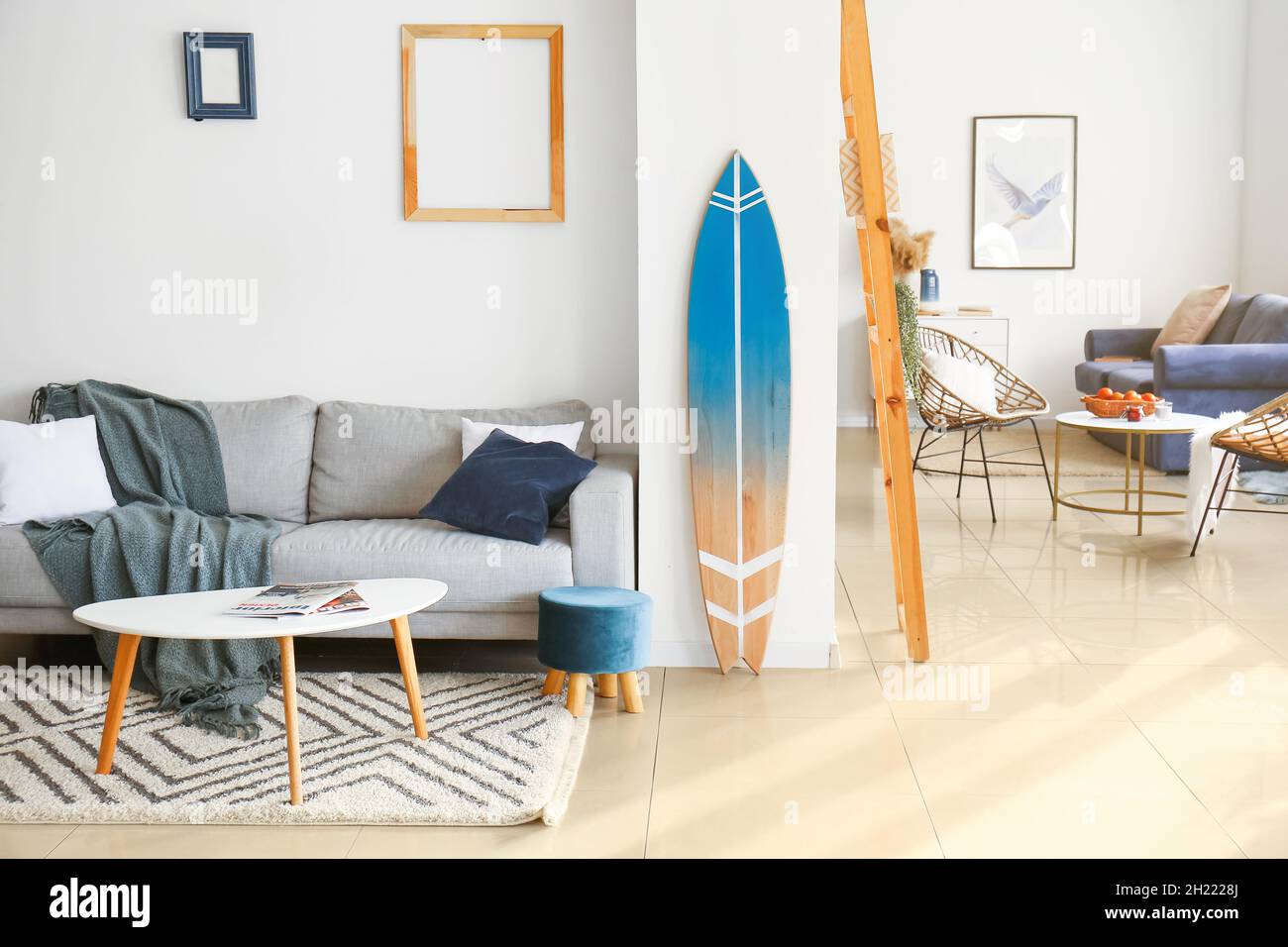 Interior of modern room with stylish surfboard Stock Photo - Alamy