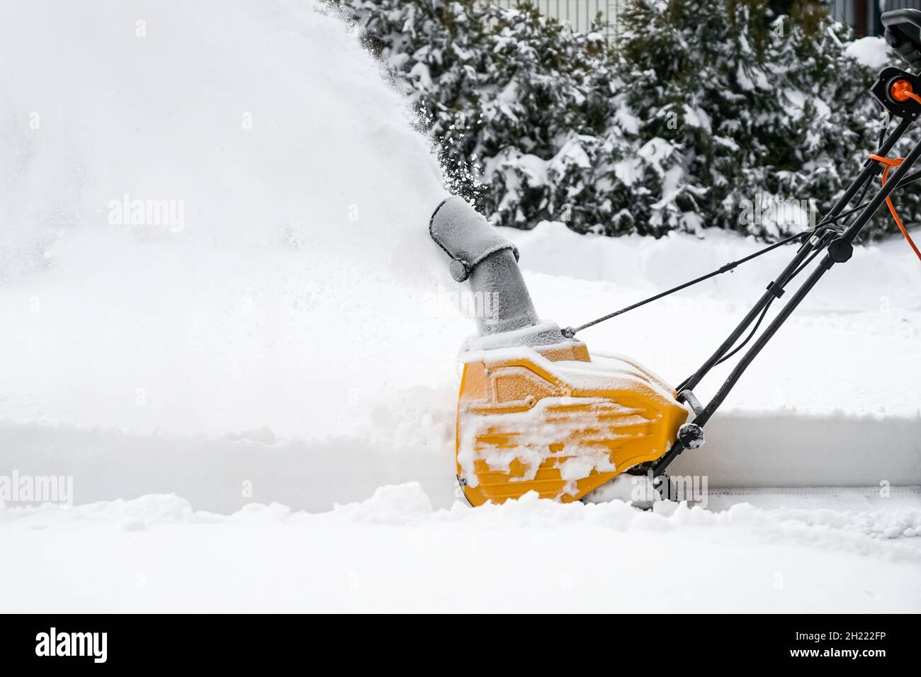 Removing of snow in yard Stock Photo - Alamy