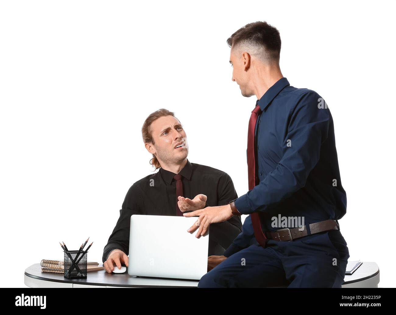 Man harassing his male colleague on white background Stock Photo - Alamy