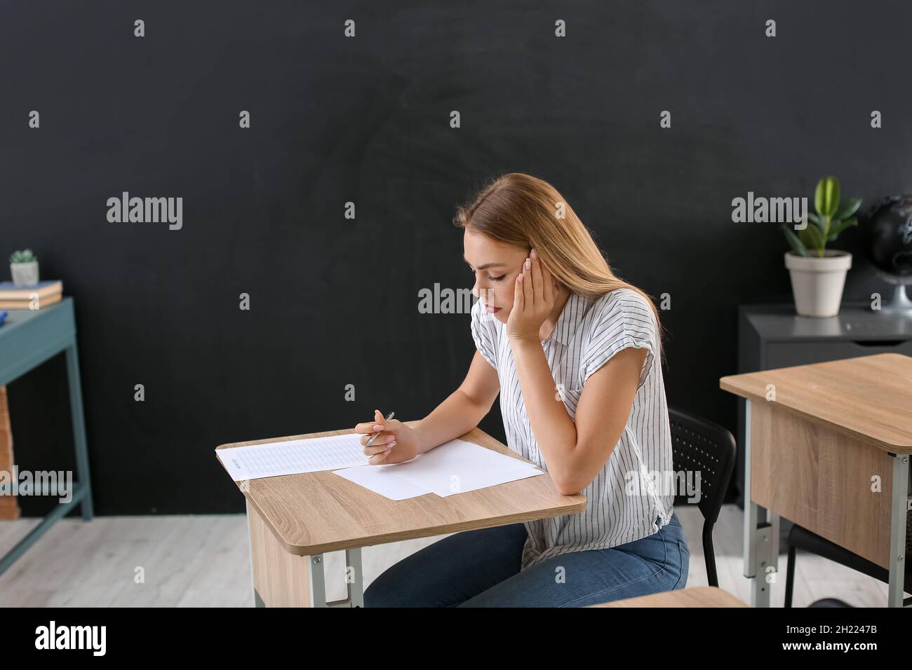 Student passing exam at school Stock Photo - Alamy