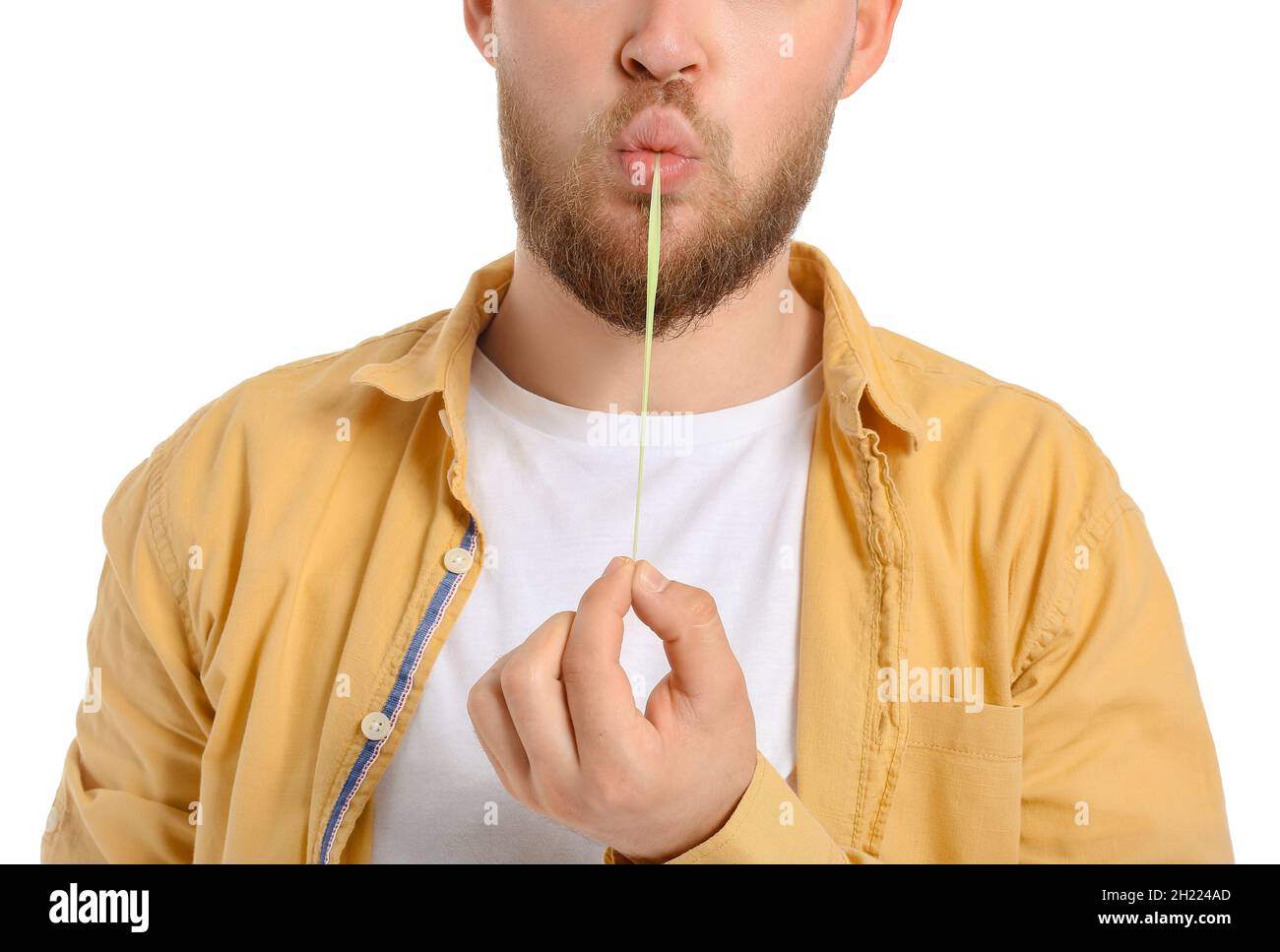 Young man with chewing gum on white background Stock Photo - Alamy