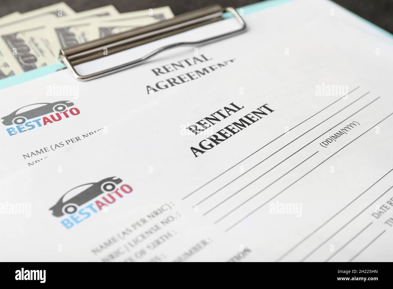 Clipboard with rental agreements, closeup Stock Photo - Alamy